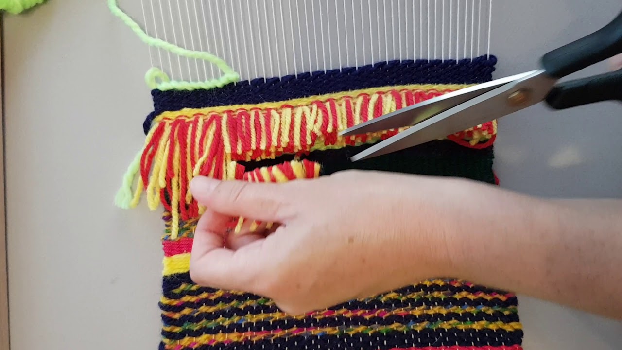 tapestry weaving -cutting the wool - YouTube