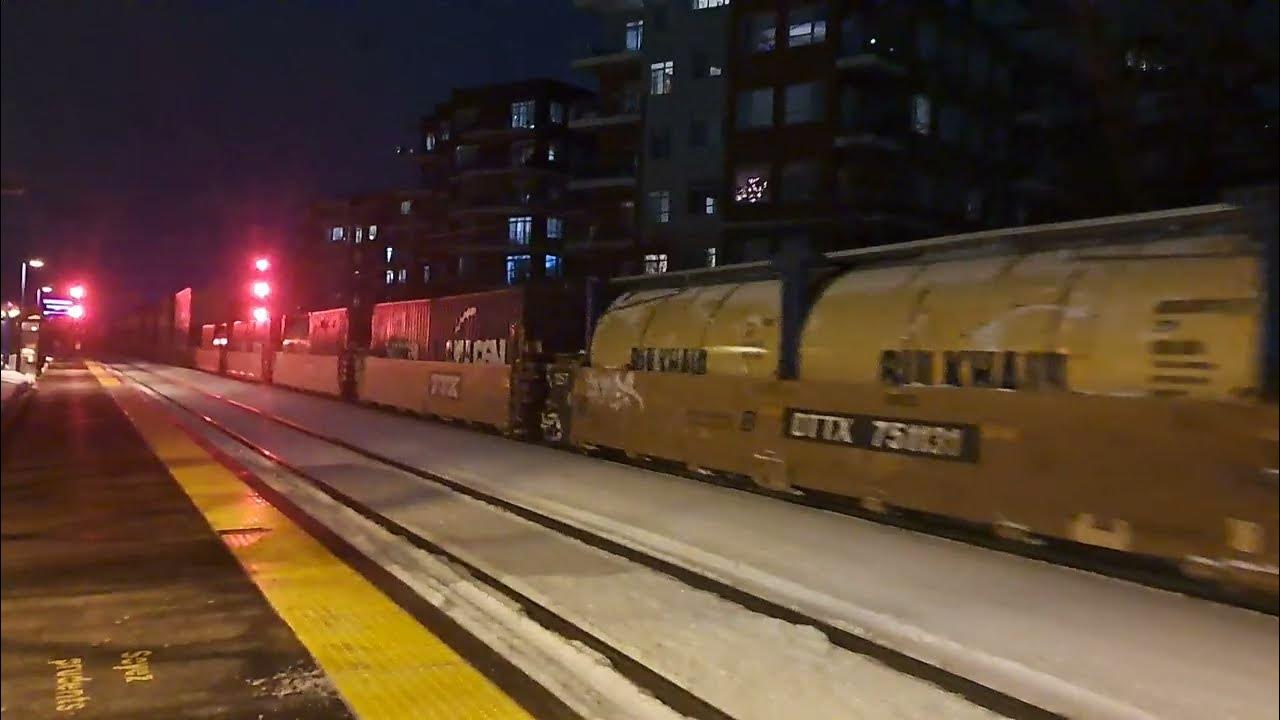 cn 3881 west leading cn 121 with inspection boxcar and heritage trailing - YouTube