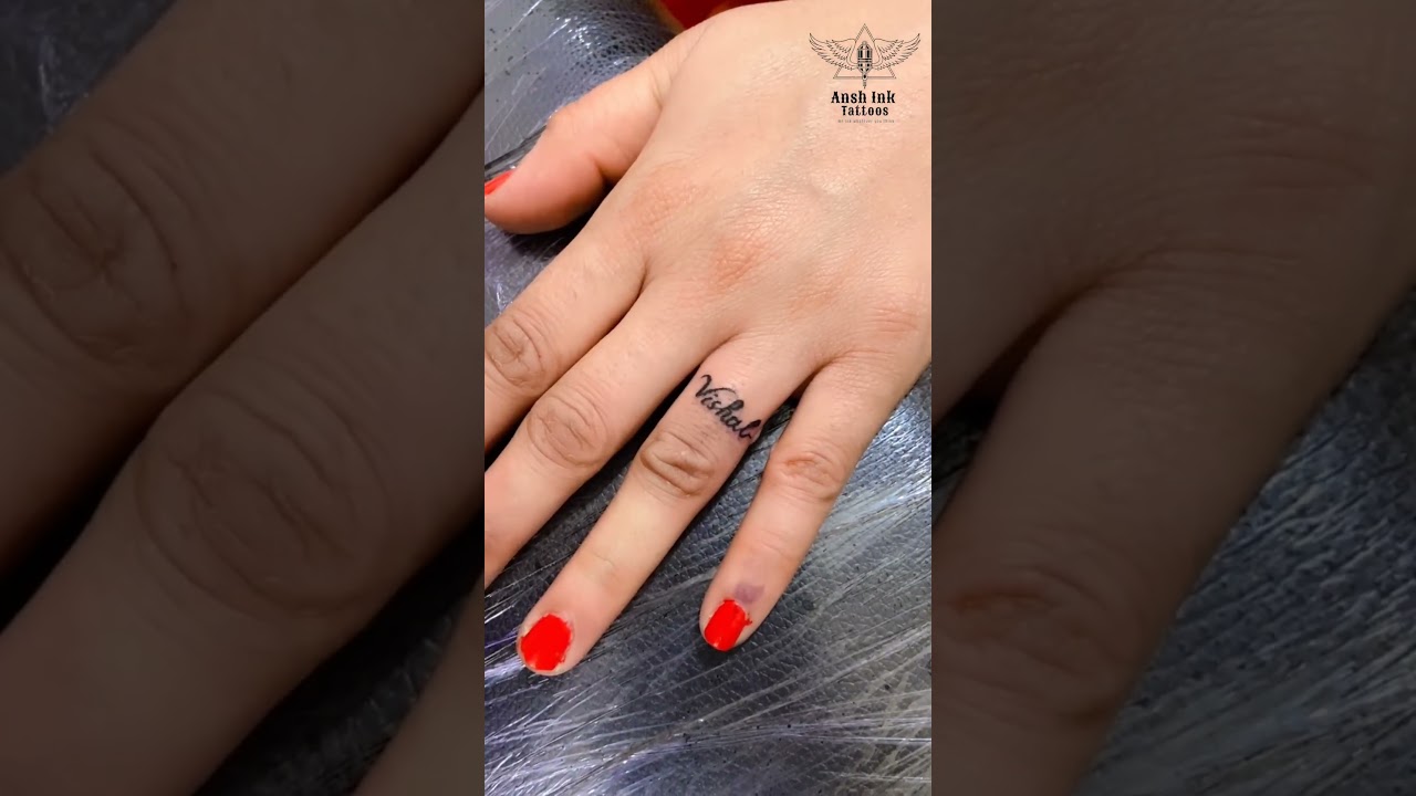 Ring Finger Name Tattoos