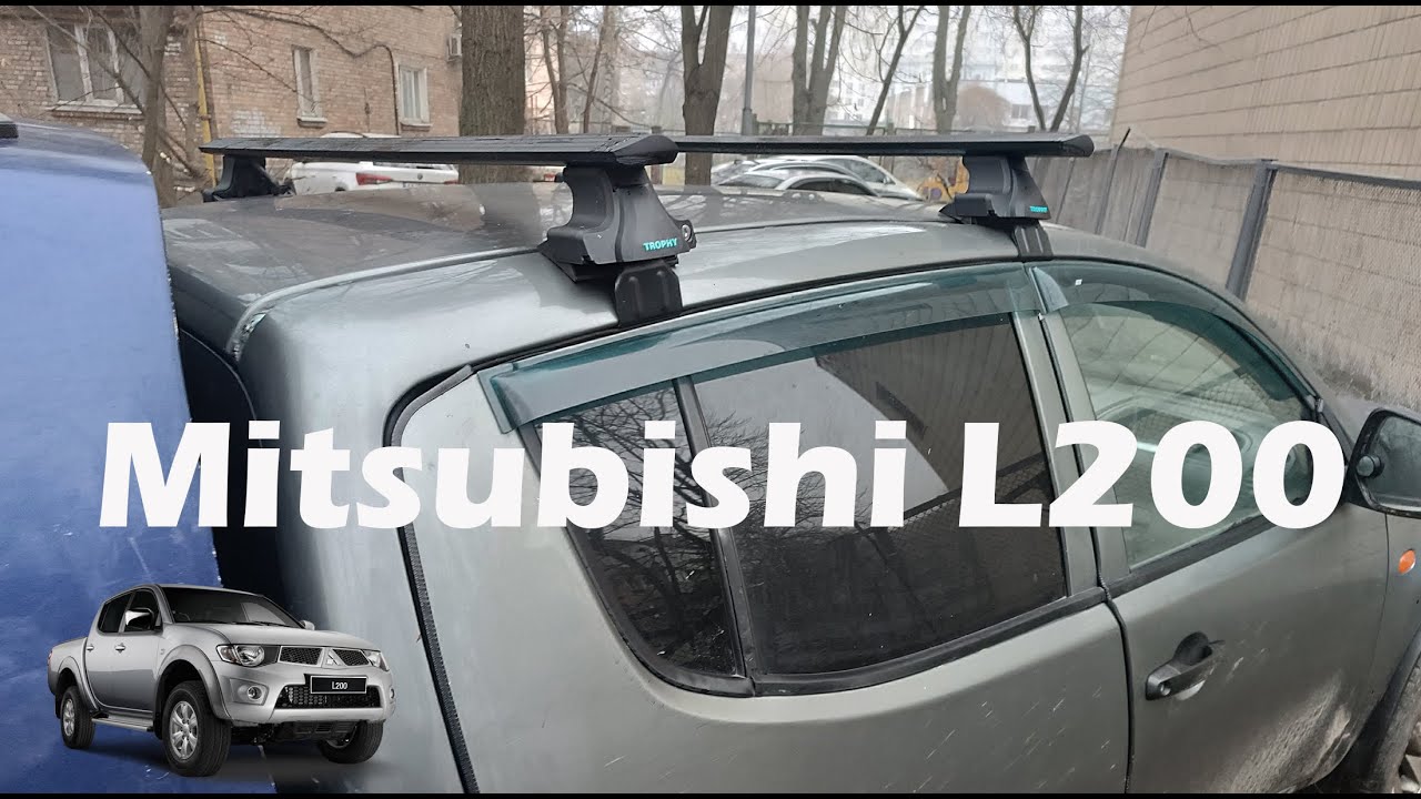 Roof rack Mitsubishi L200 Crossbars Installation - YouTube