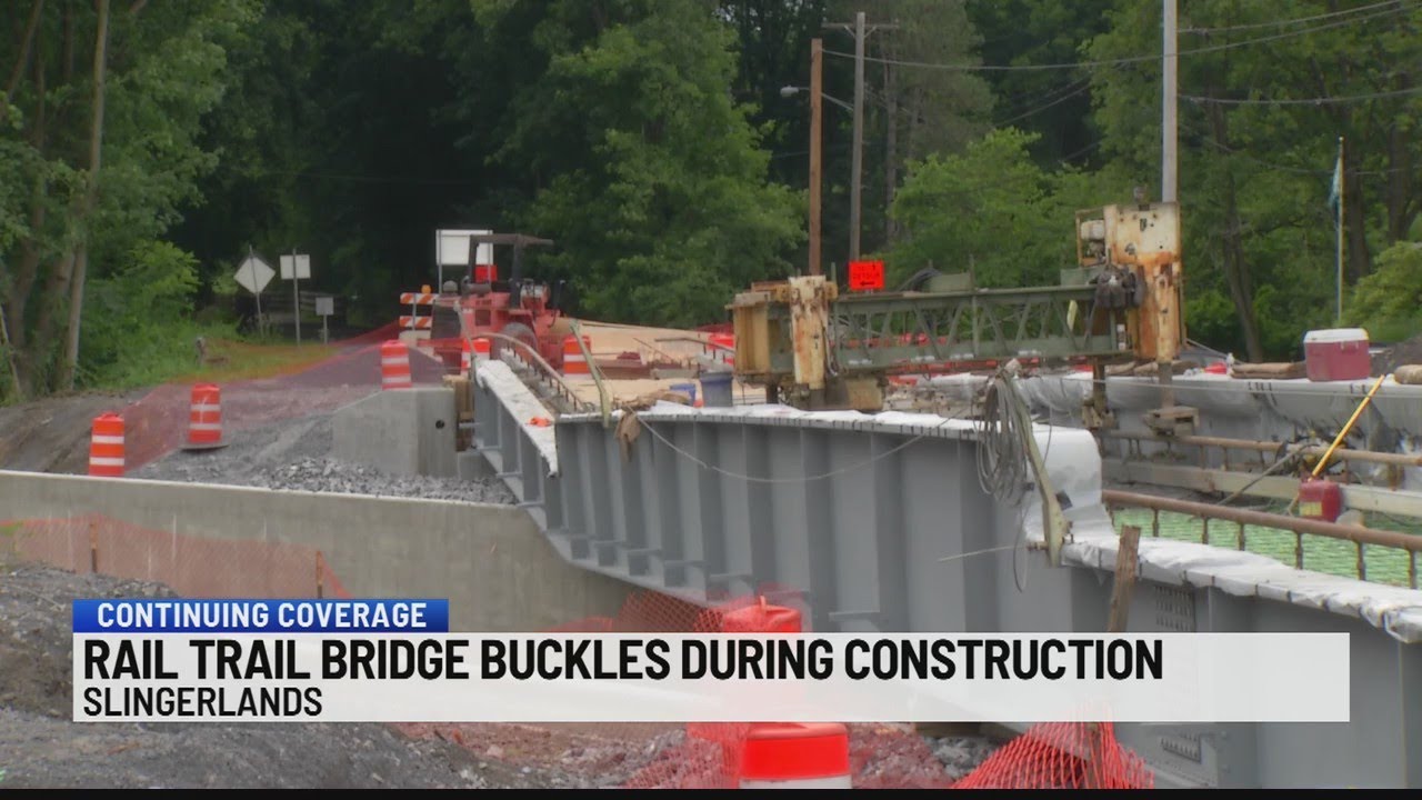 Rail trail bridge buckles during construction - YouTube