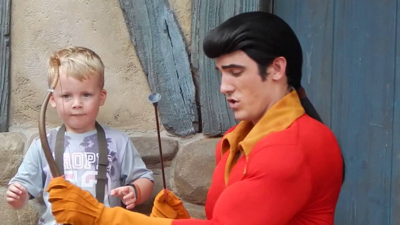 GASTON teaches tiny how to shoot bow & arrow Disney World Magic Kingdom ...