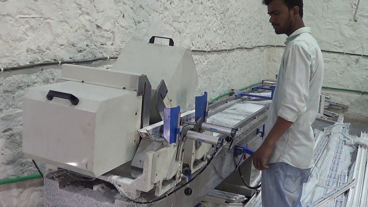 Double head cutting machine for upvc windows and doors - YouTube