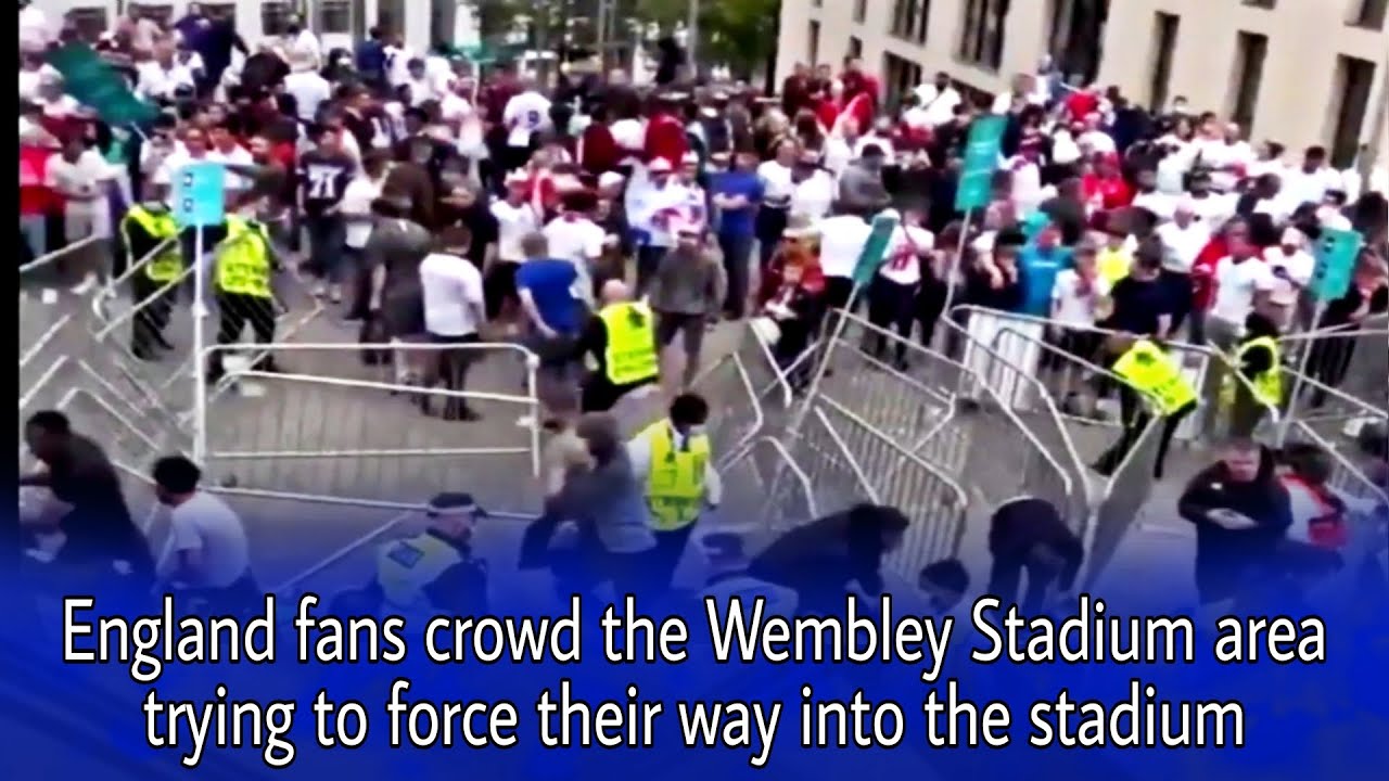 England fans crowd the Wembley Stadium area trying to force their way ...