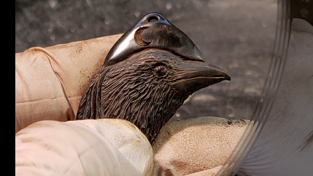 Raven Pendant carved in fossil Black jet stone - YouTube