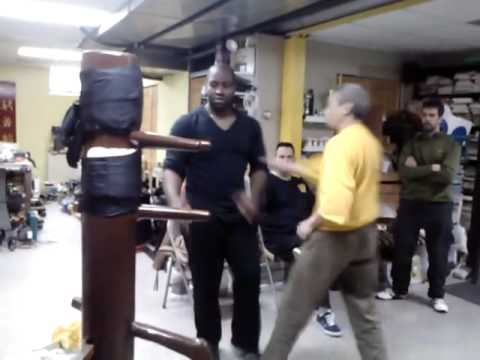 Shawn Obasi on 400lb Wooden Dummy - YouTube