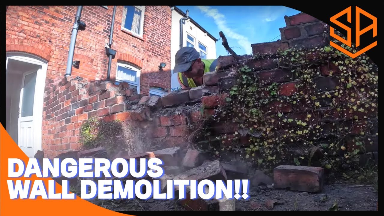 DANGEROUS WALL DEMOLITION!! - YouTube