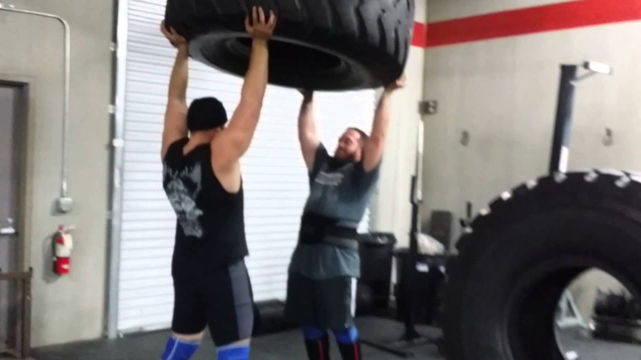 Tire overhead press 550 pounds - YouTube