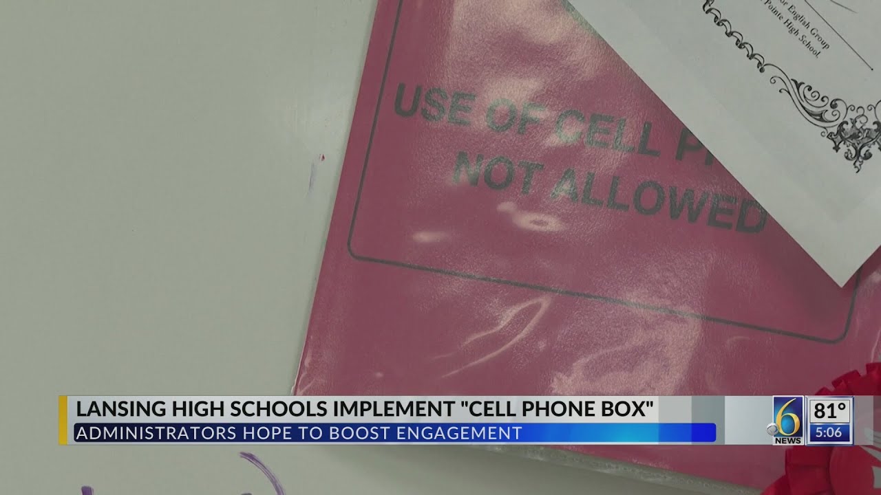 Lansing High Schools implement cell phone box - YouTube
