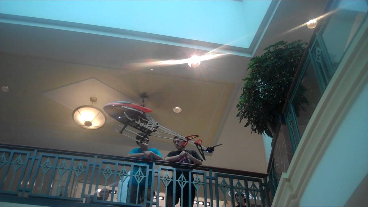 GUY FLIES TOY HELICOPTER IS THE MALL - YouTube