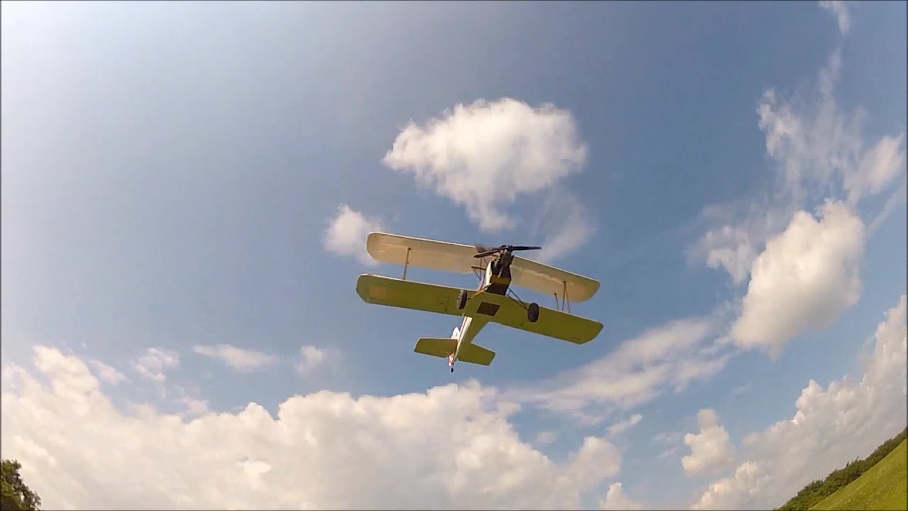 SLO-MO Low Flyby of Andrews Aeromaster Biplane - YouTube