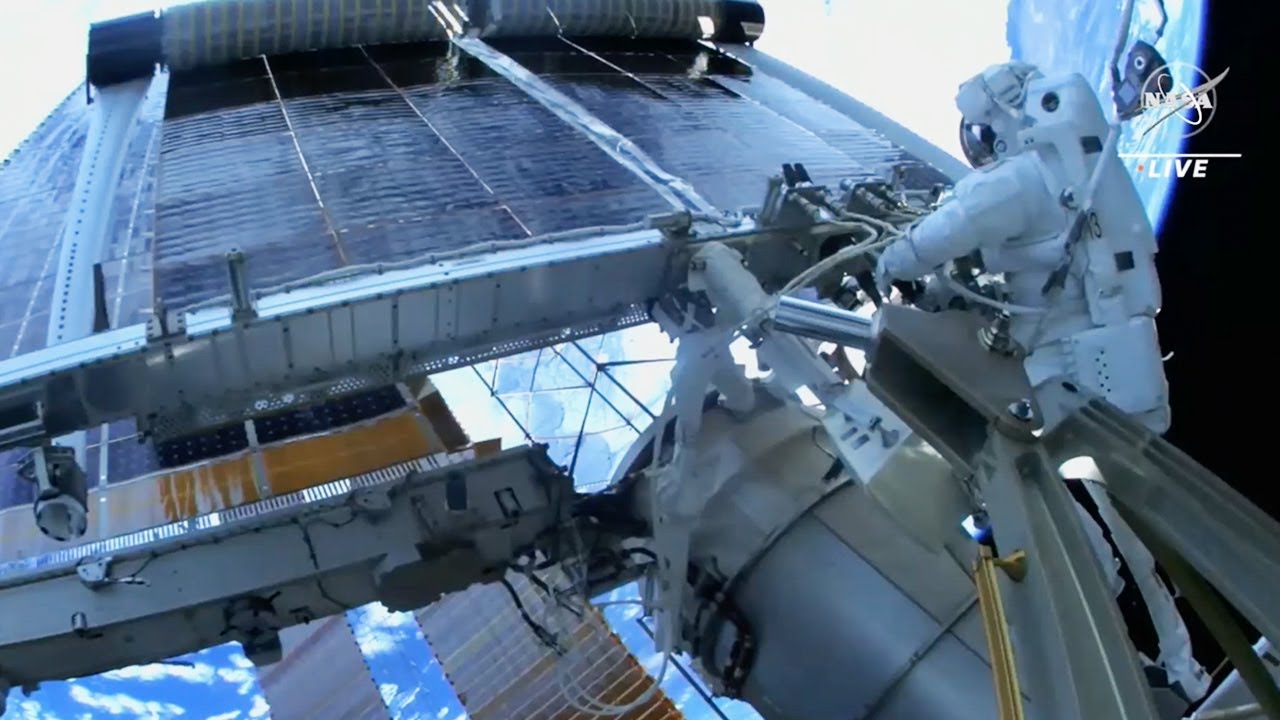 Rollout Solar Array deployed during spacewalk outside space station ...