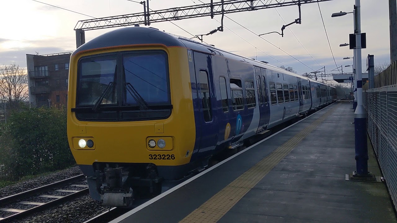 Refurbished Class 323 departs East Didsbury - YouTube