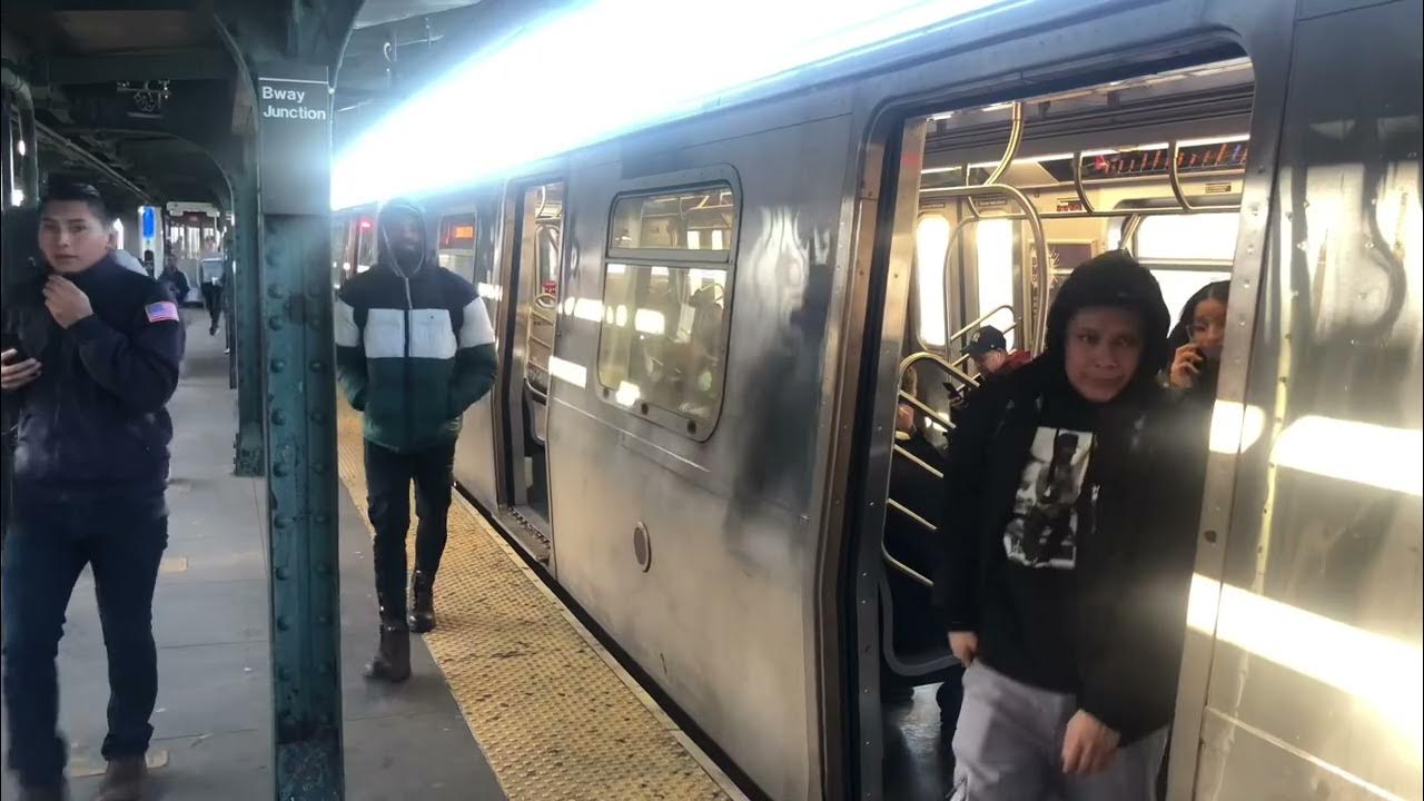 Manhattan bound R160 J train arriving and departing at Broadway Junction with an R179 J train ...