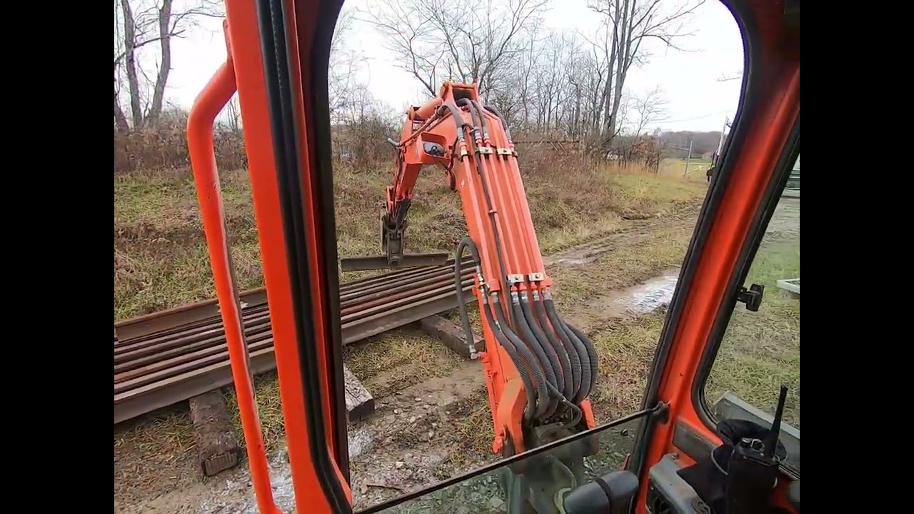 Moving Rail Plugs with a Mini Excavator - YouTube