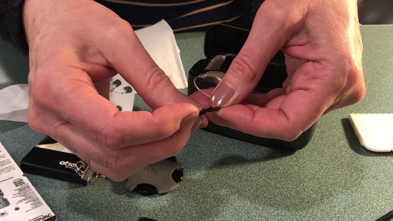 How to care for your Receiver in the Ear hearing aid - YouTube
