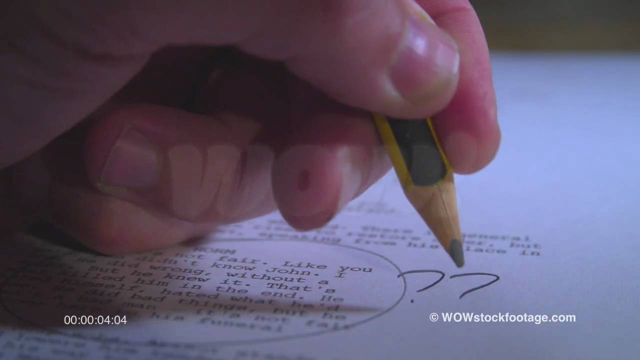 Hand holding a pencil and editing a script SF1268 - YouTube