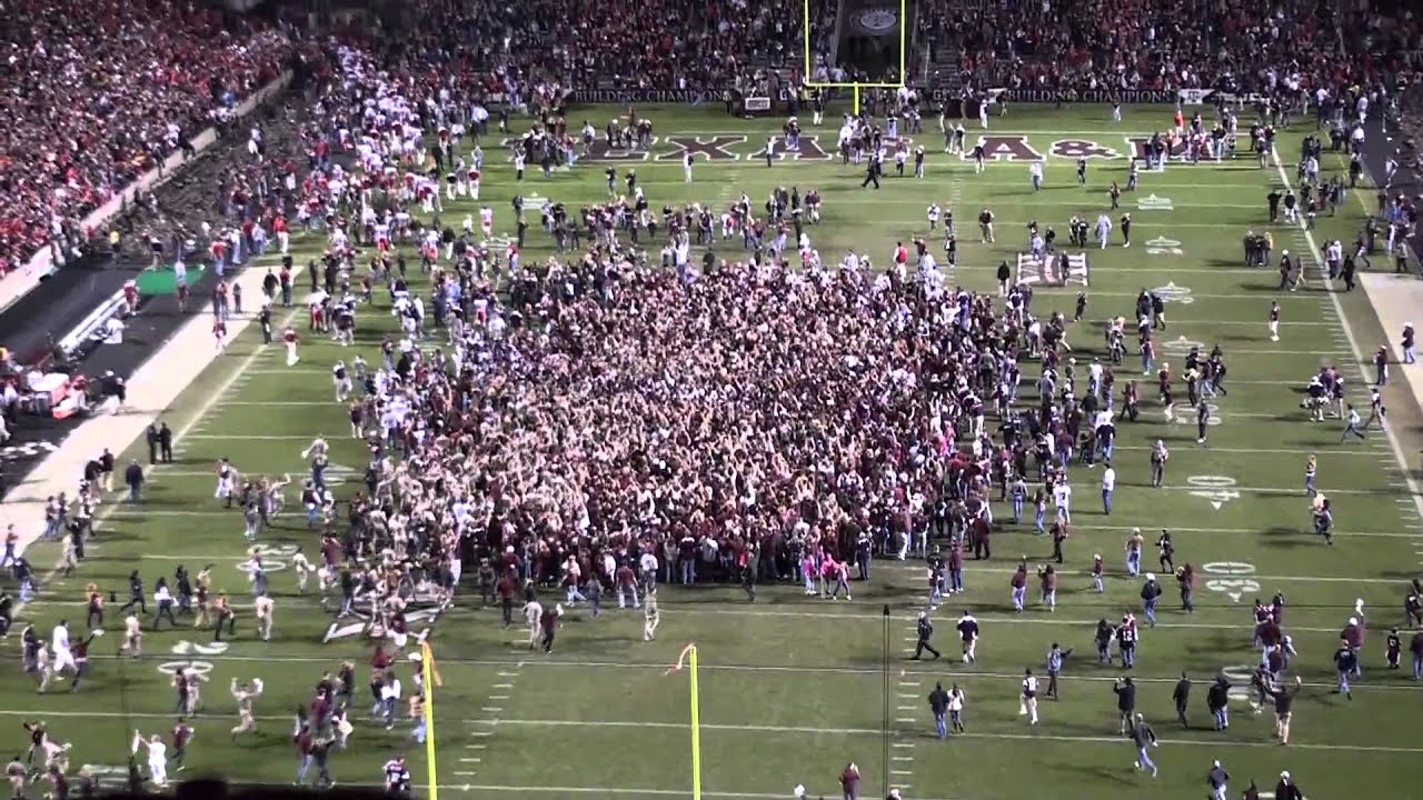 Aggies storm the field after beating Nebraska - YouTube