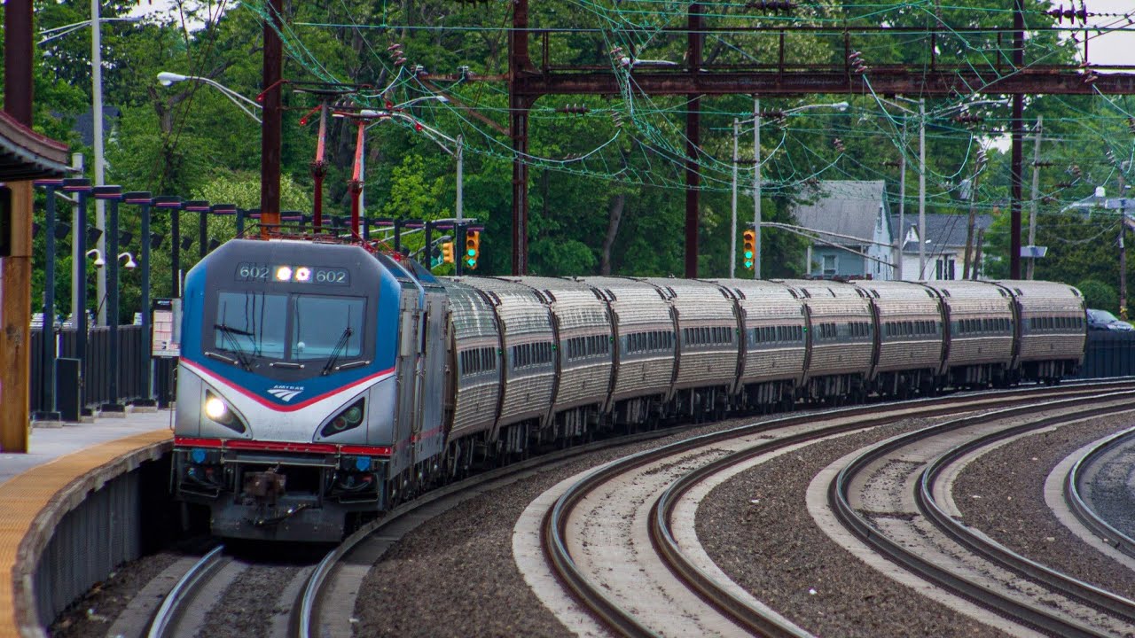 Amtrak 99 "Northeast Regional" Stops And Departs Metropark Double ...