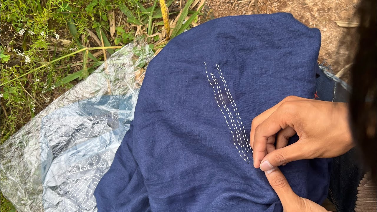 Some art on broken shirt, sashiko handstitching. - YouTube