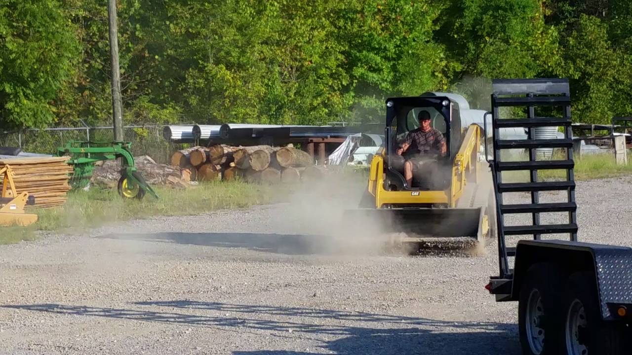 Cat 239D track loader - YouTube