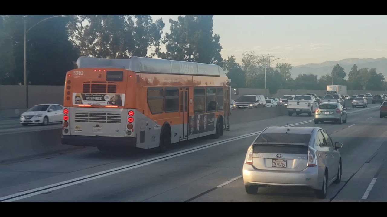 Metro green line heading to Norwalk and Metro local New Flyer Excelsior ...