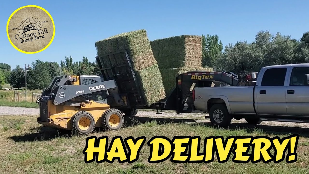 Getting our hay the easy way!! - YouTube