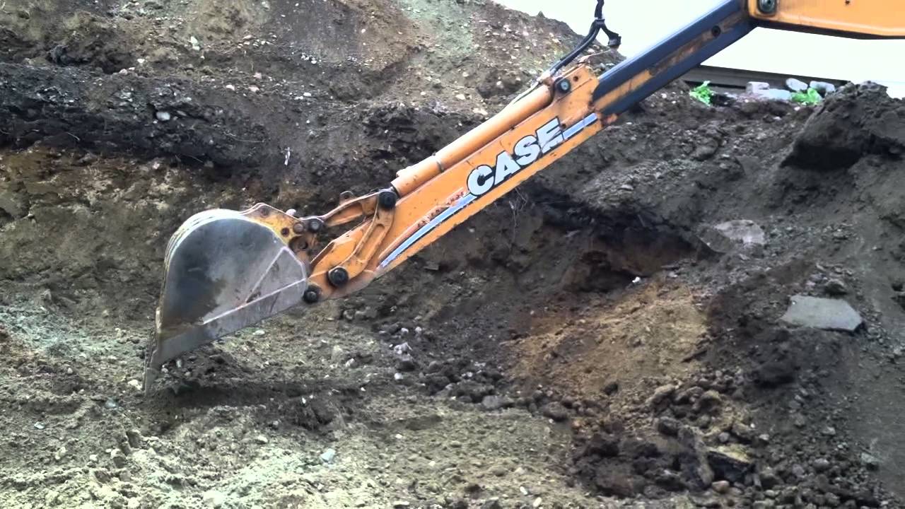 Backhoe Digging A Foundation