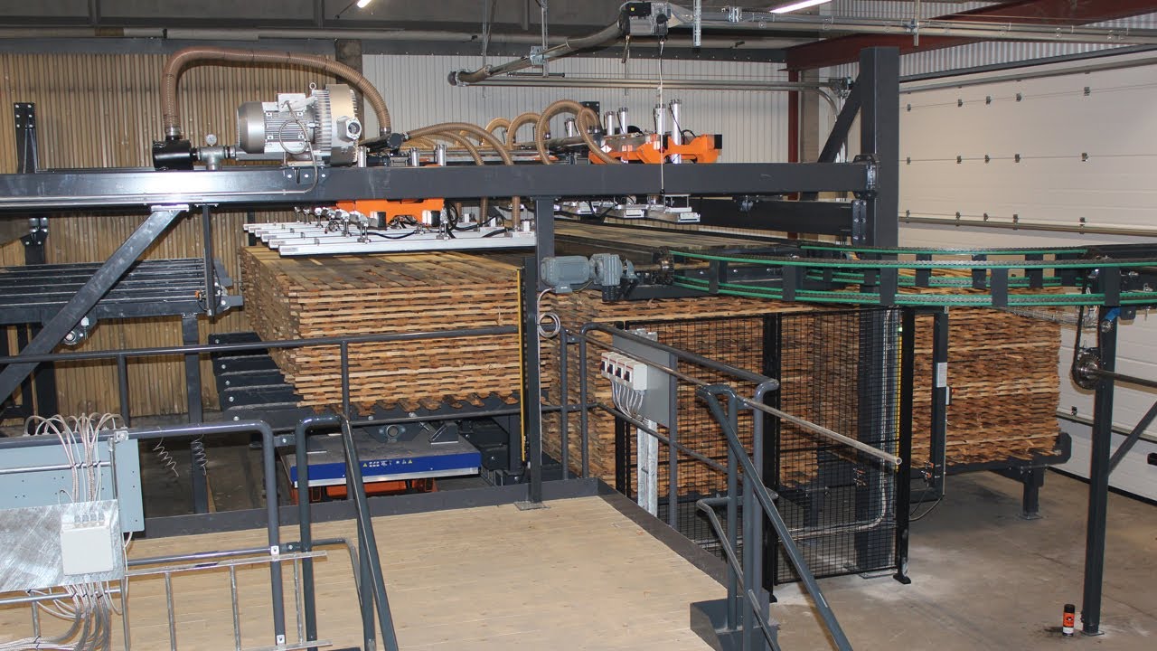 Vacuum infeeder for cross-cut line - YouTube