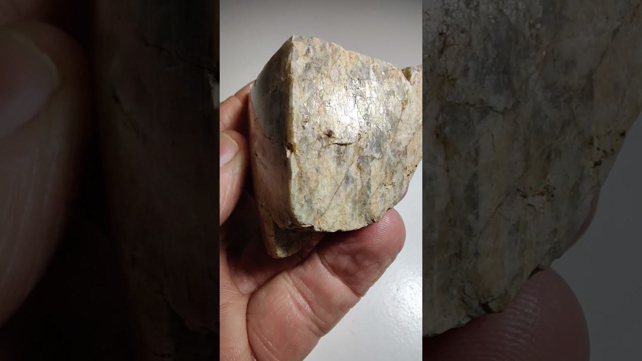 Moonstone, dome polished. From Marathon County Wisconsin. - YouTube