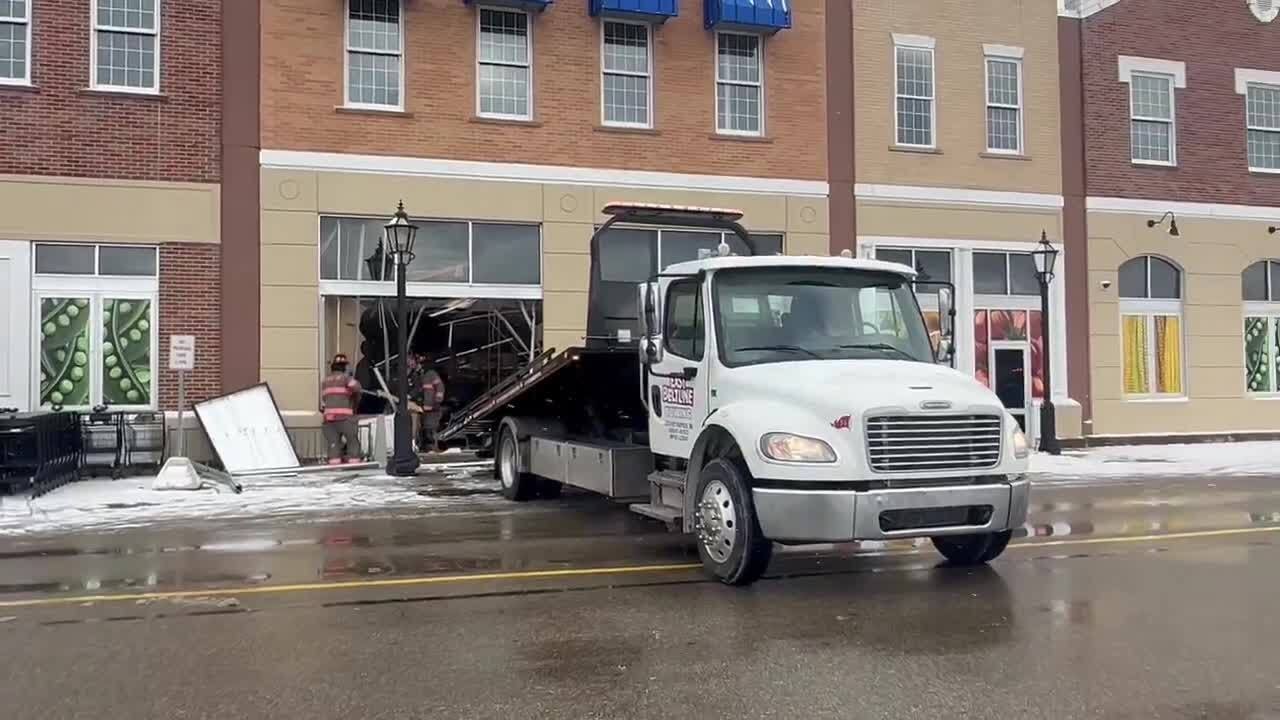 Crews respond after car crashes in to Cascade Meijer - YouTube