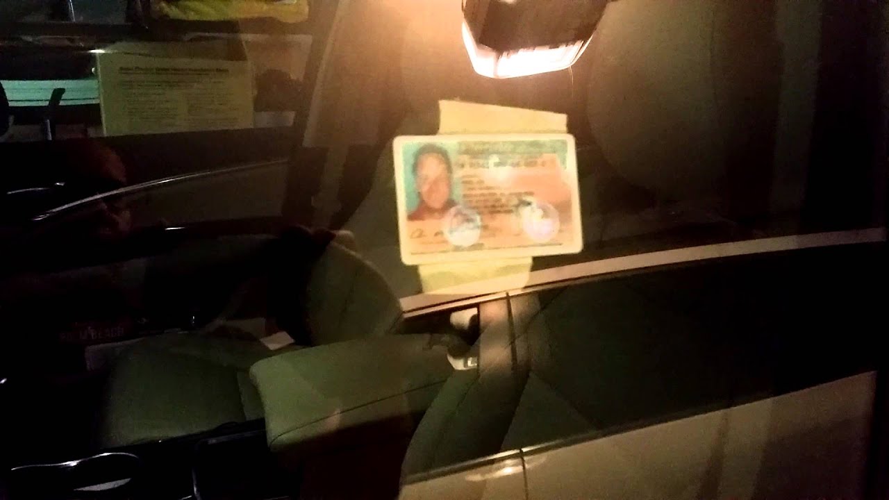 Drivers license hologram visible from outside car - YouTube