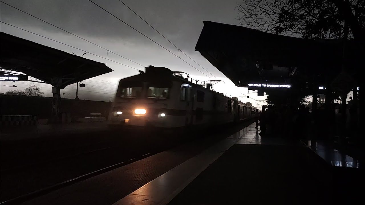 ARRIVING AT THE TRAIN STATION AT A TERRIFYING SPEED DURING HEAVY RAINS ...