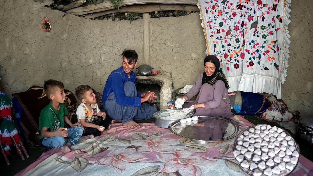 Preparation of curd from yogurt by a nomadic woman in a traditional way ...