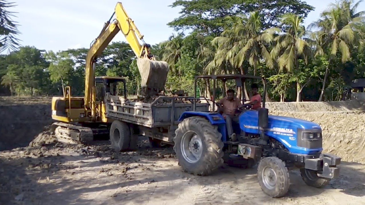 Caterpillar e70b Excavator Loading tractor And Operator View video 1 ...