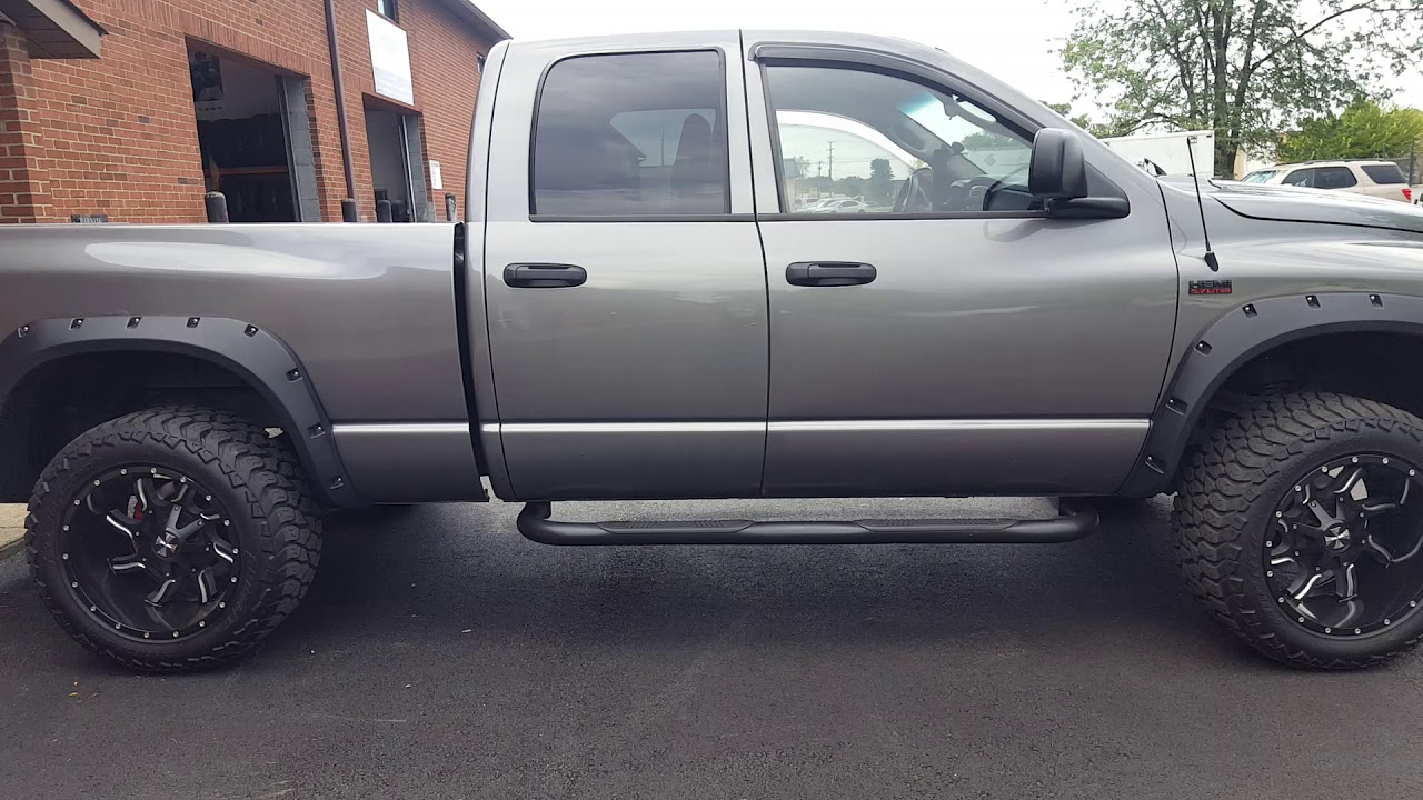 Dodge Ram custom rims and leveled - YouTube
