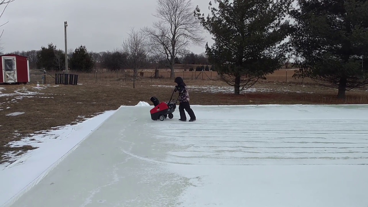 Ice rink cleaning with snow thrower - YouTube