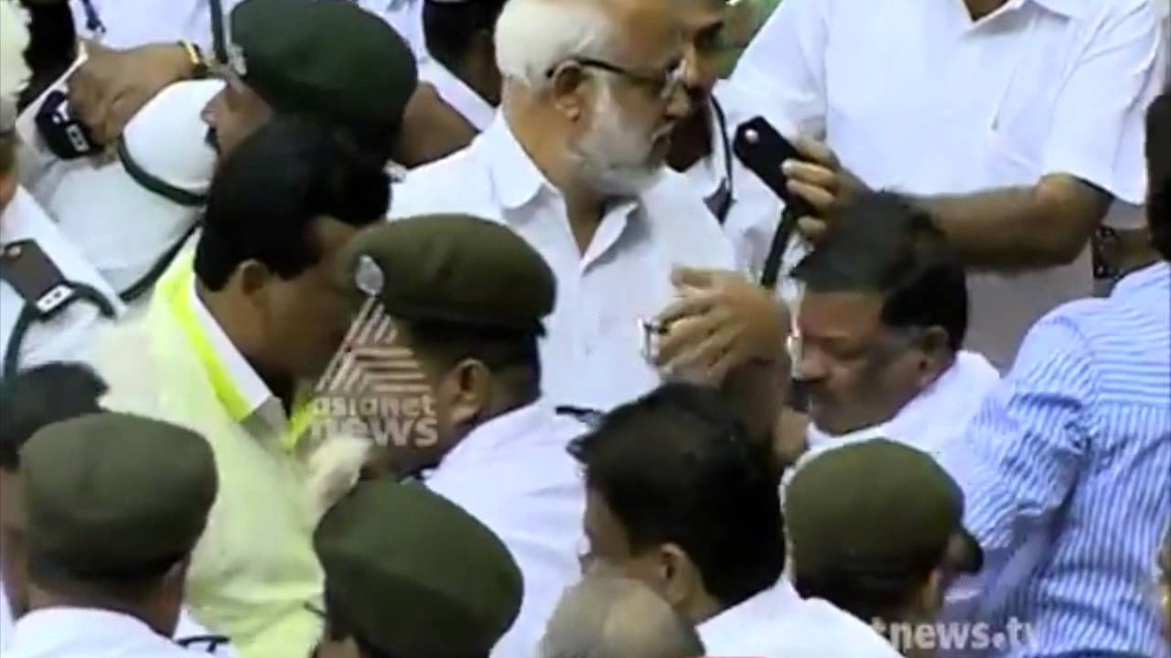 Politicians Fighting in Kerala Assembly - YouTube