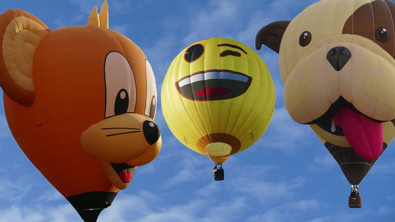 100's of happy hot air balloons (spot the grumpy one) - YouTube