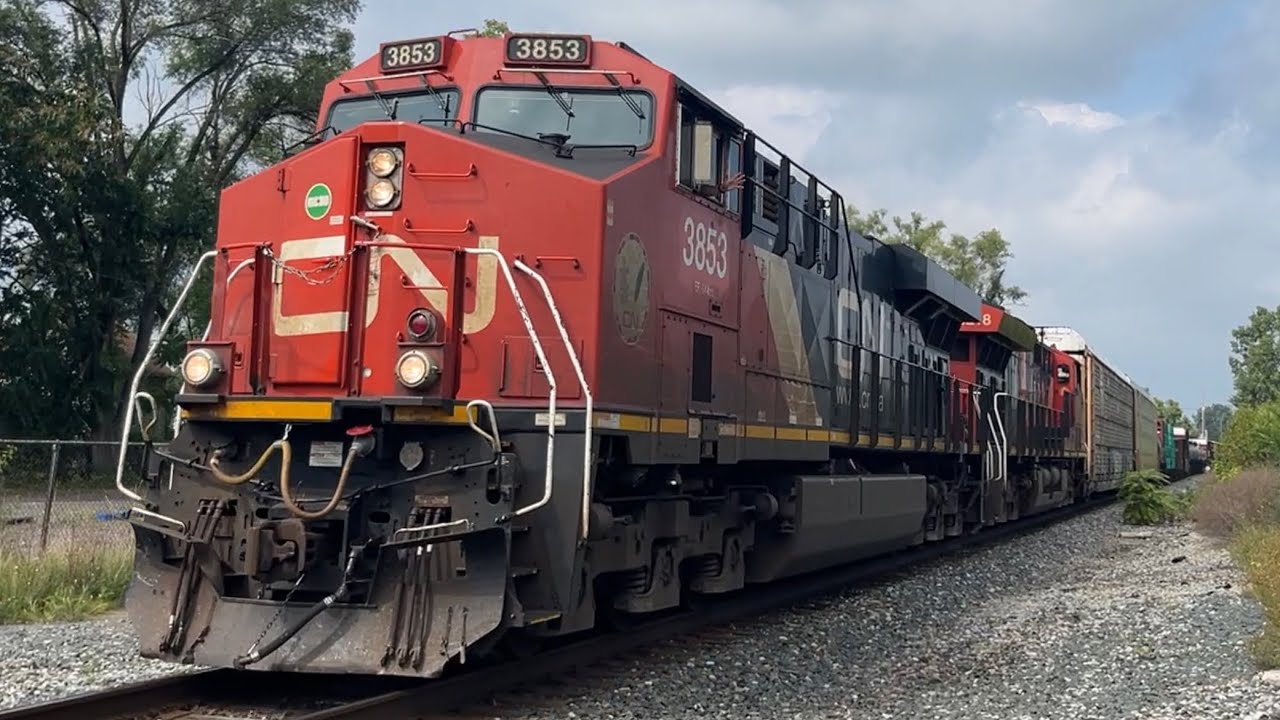 CN #’s 3853 (ES44AC) & 3218 (100th Anniversary) (ET44AC) lead CN M385 ...