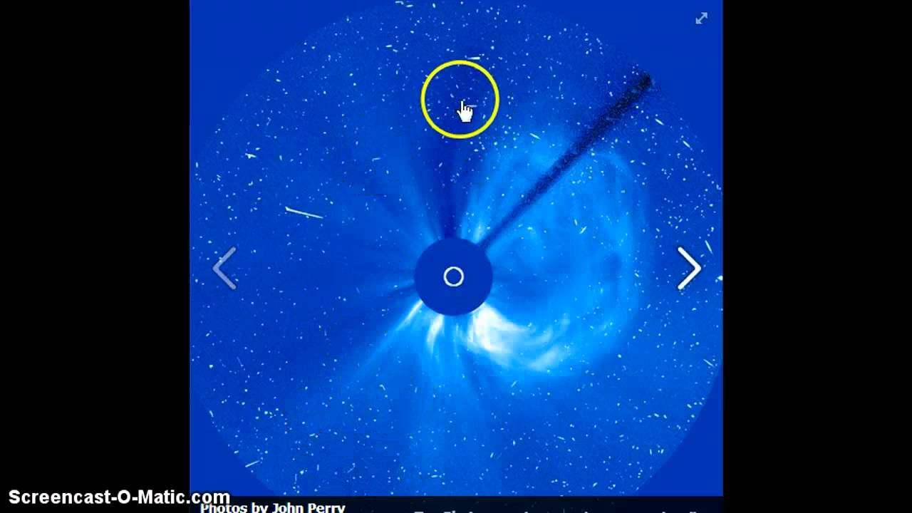 WHAT ARE ALL OF THESE OBJECTS NEXT TO THE SUN?? UFO'S? ASTEROIDS ...