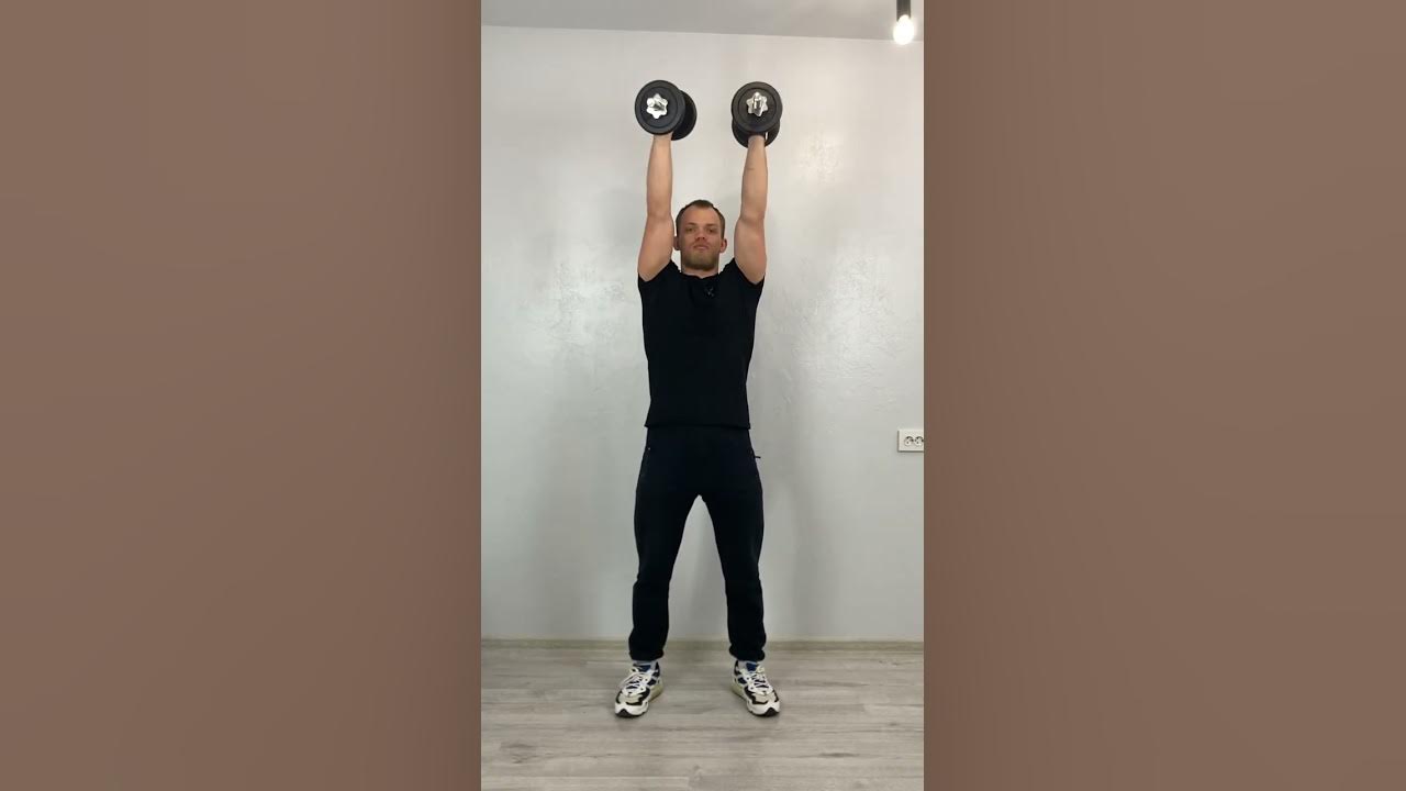 Приседания с пружиной внизу + вертикальный жим гантелей перед собой ...