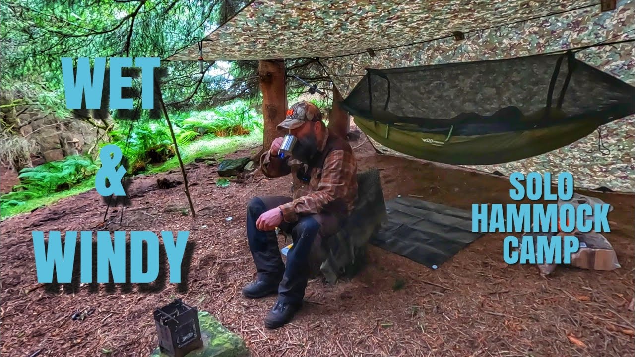 A wet and windy solo hammock camp Tarp shelter - YouTube