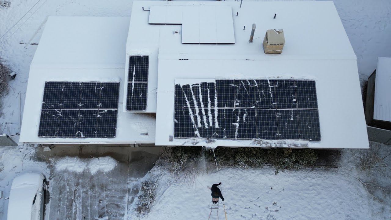 Solar Panel Snow Removal - YouTube