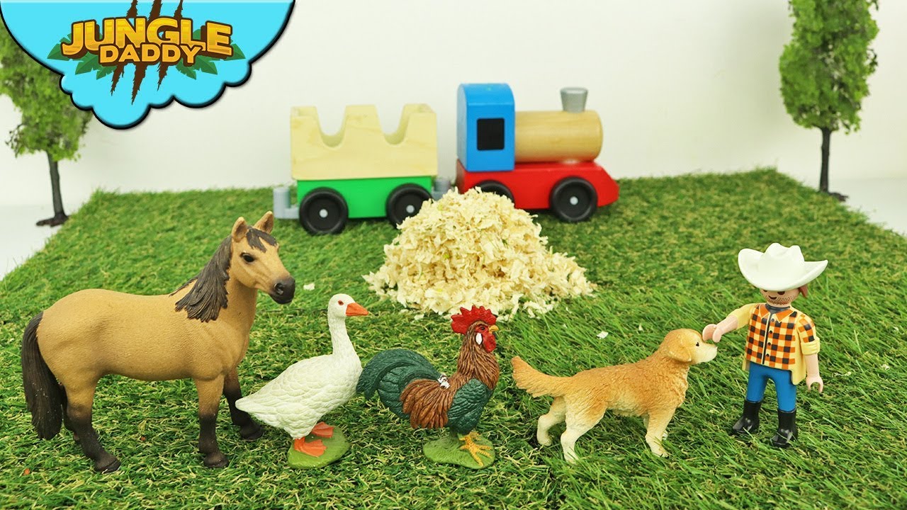 Learn FARM ANIMALS under the hay! Surprise ranch train schleich and ...