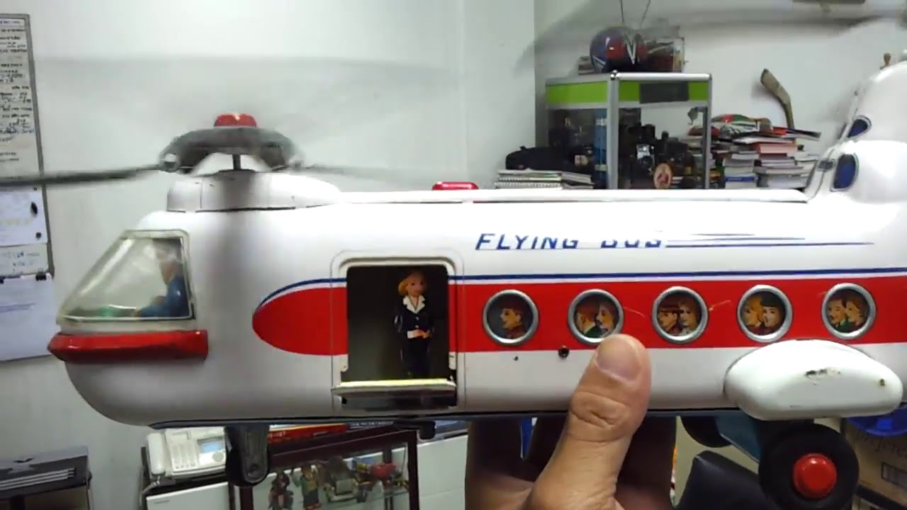 FLYING BUS BATTERY OPERATED TIN TOY JAPAN - YouTube