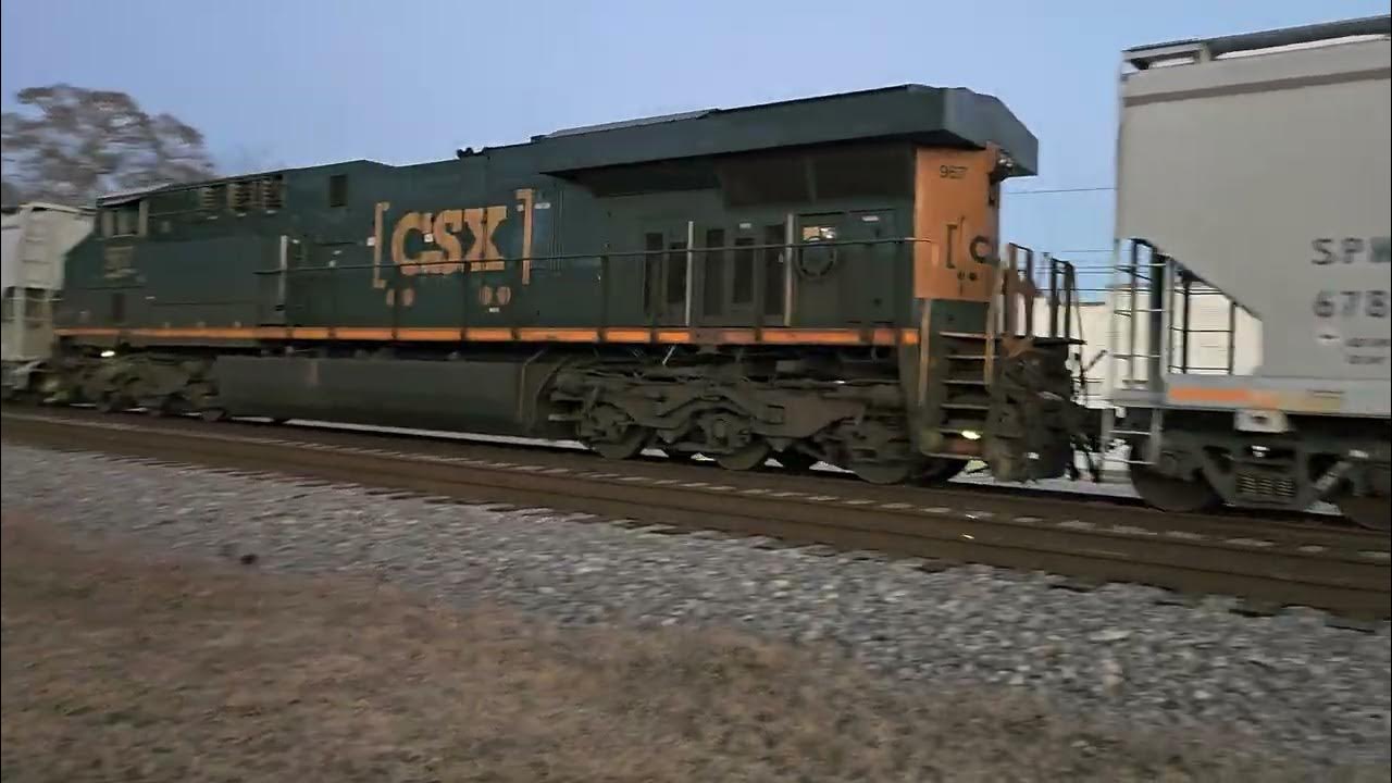 CSX M421-05 with an CM44AC Leading and a ES44AH Mid DP with a nice friendly way from the ...