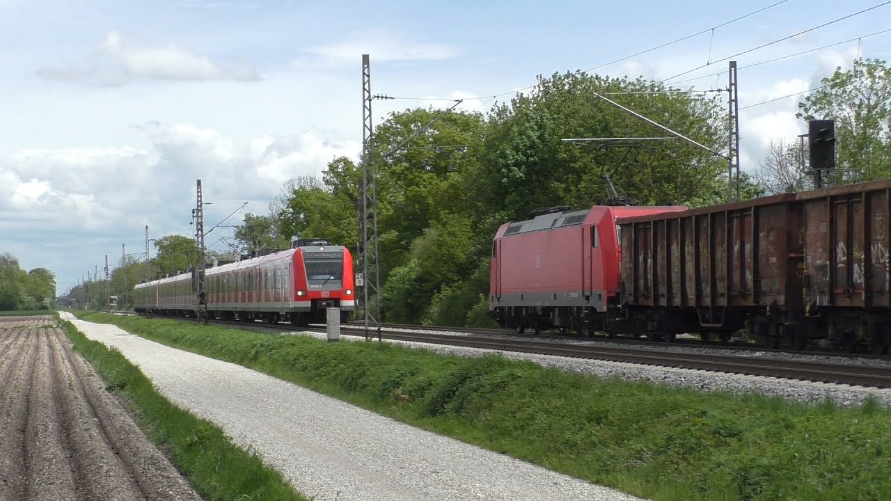 EMU Commuter Train meeting Freight Train - YouTube