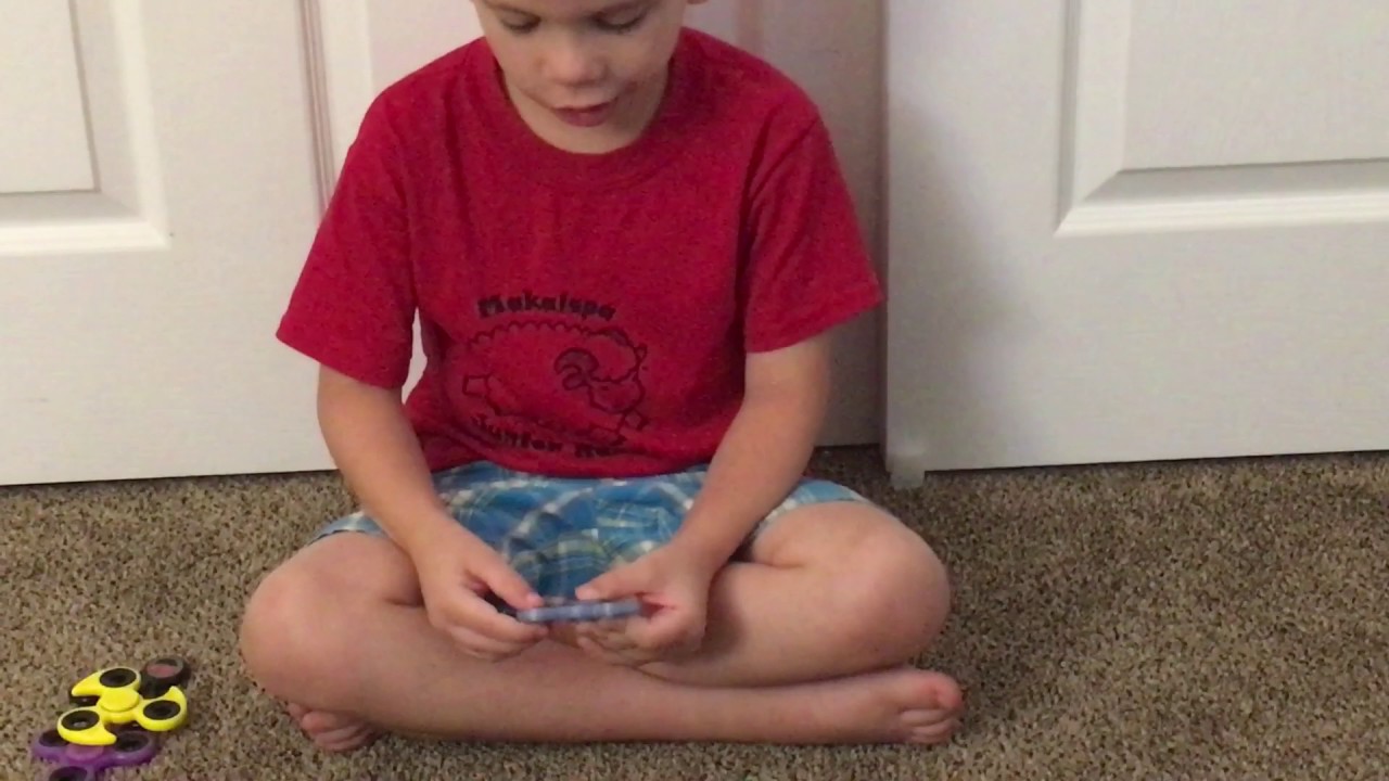 John and his fidget spinners/fidget cubes - YouTube
