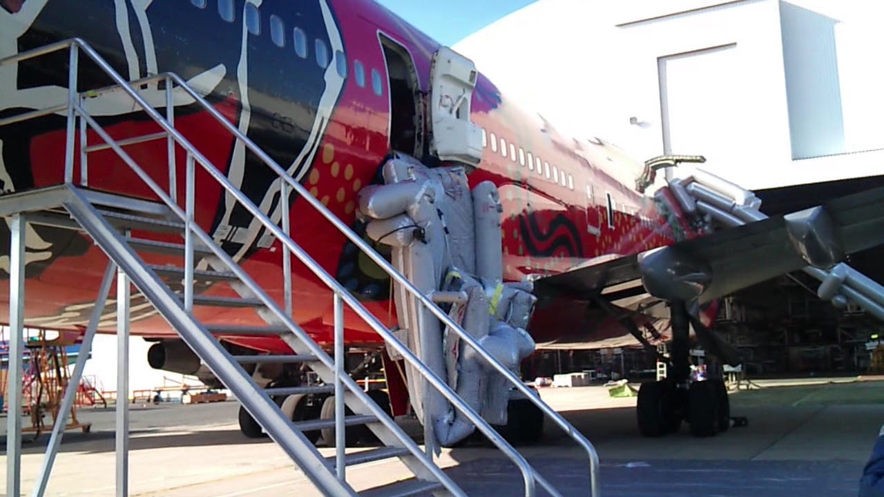 Qantas Boeing 747 deploying emergency slide 1 - YouTube